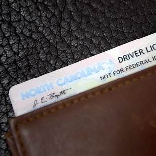 A punch drivers license that has not expired and has not been punched ...